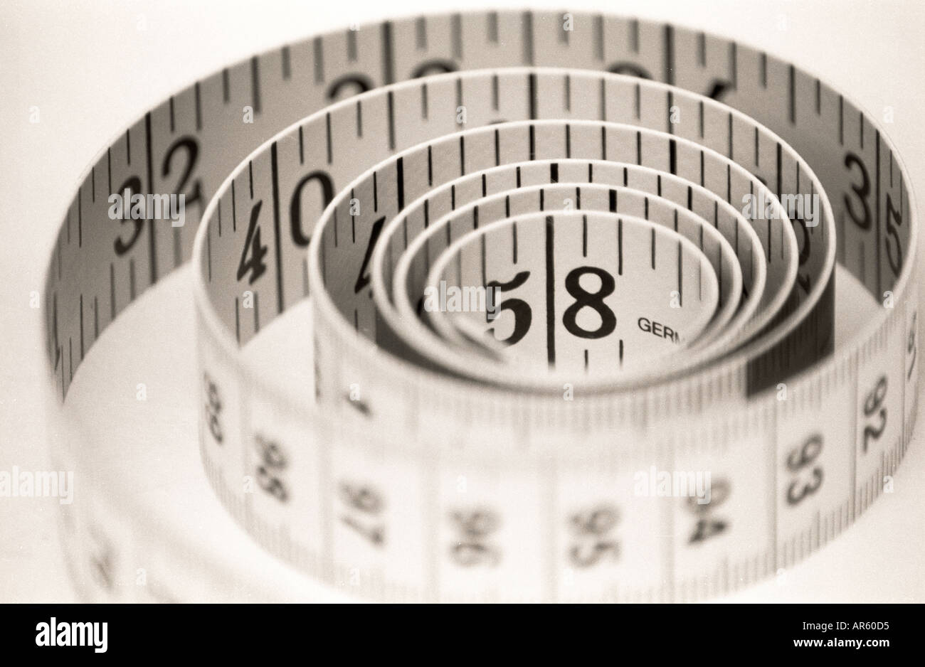 Coiled tape measure Stock Photo - Alamy