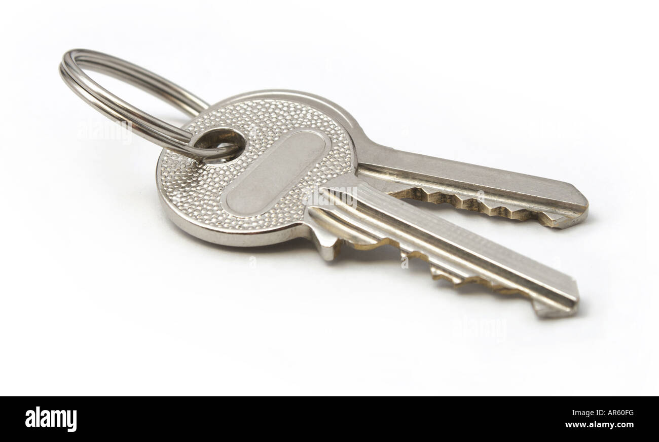 Keys with blank label Isolated on white background Stock Photo - Alamy