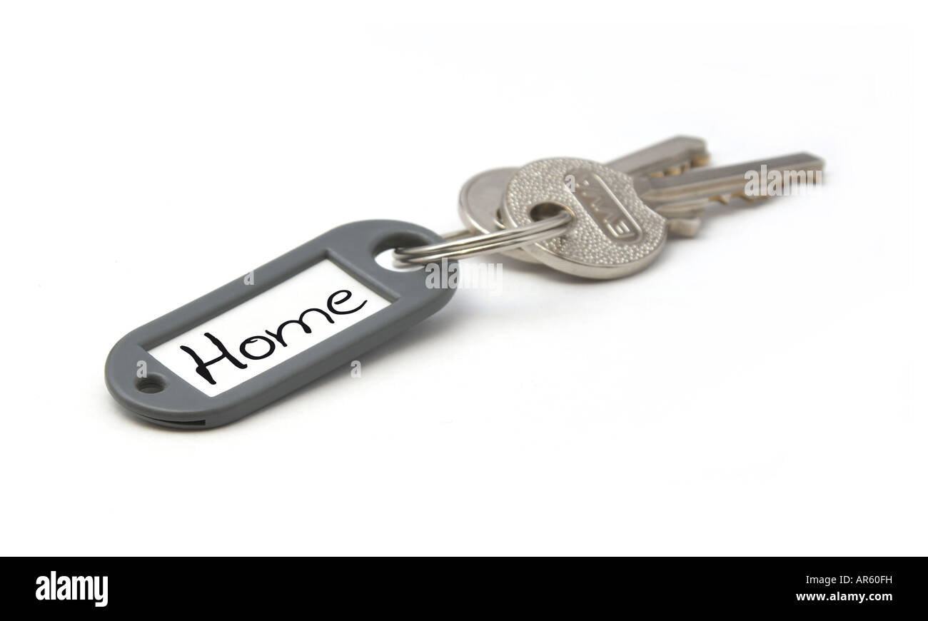 Key with home tag Isolated on white background Stock Photo - Alamy