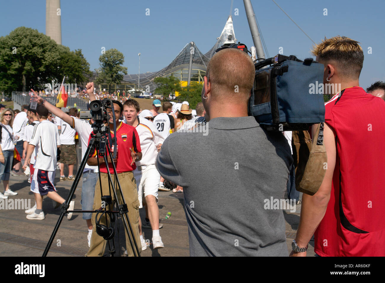 German TV team filming foreigner report reporting the WM Olympia park ...