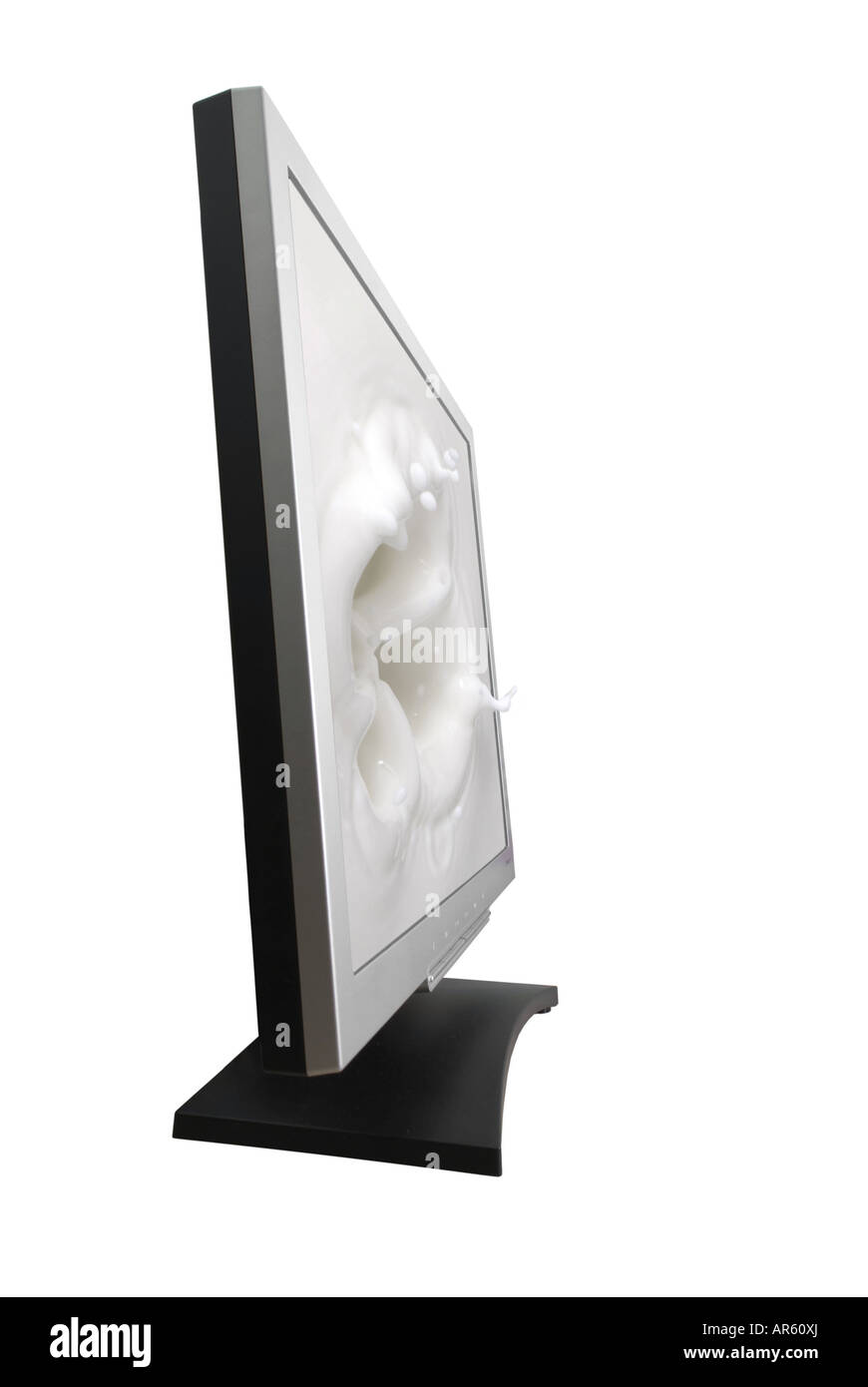 Photo of a computer monitor With a splash into white liquid Stock Photo ...