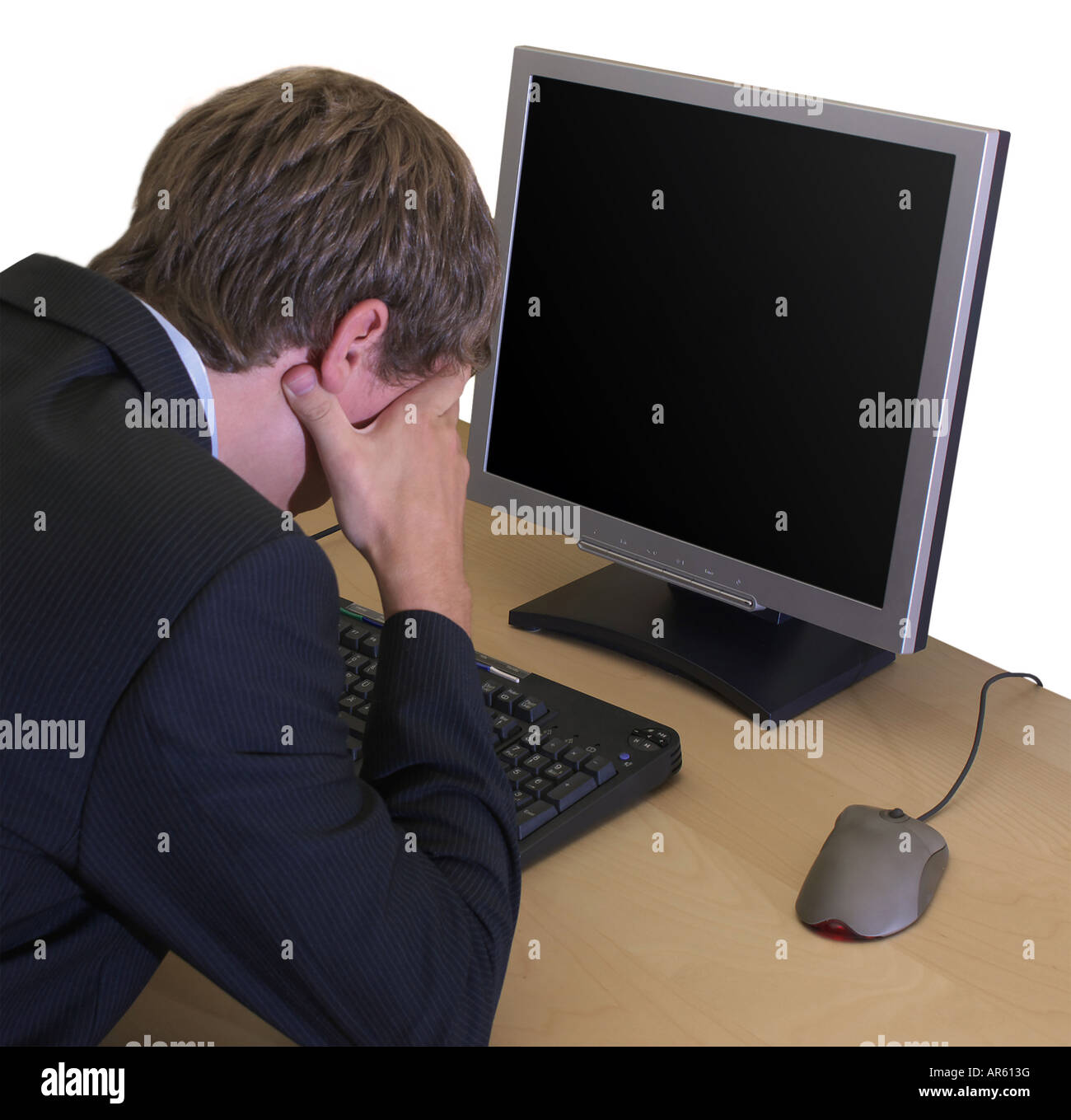 Business man at office table Looking frustrated at the display Stock ...