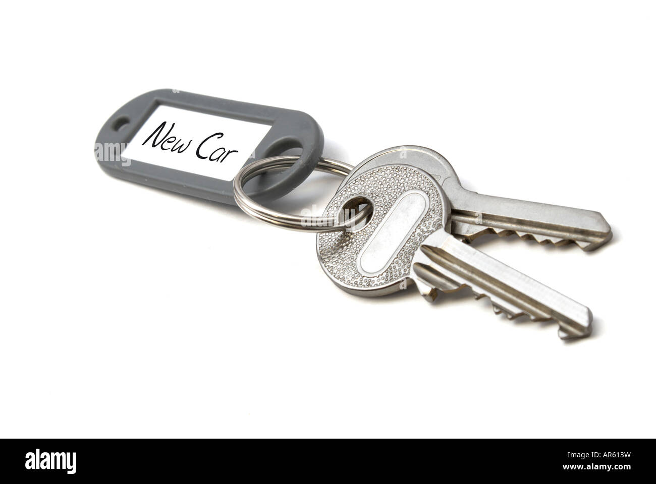 Key with new car tag Isolated on white background Stock Photo - Alamy