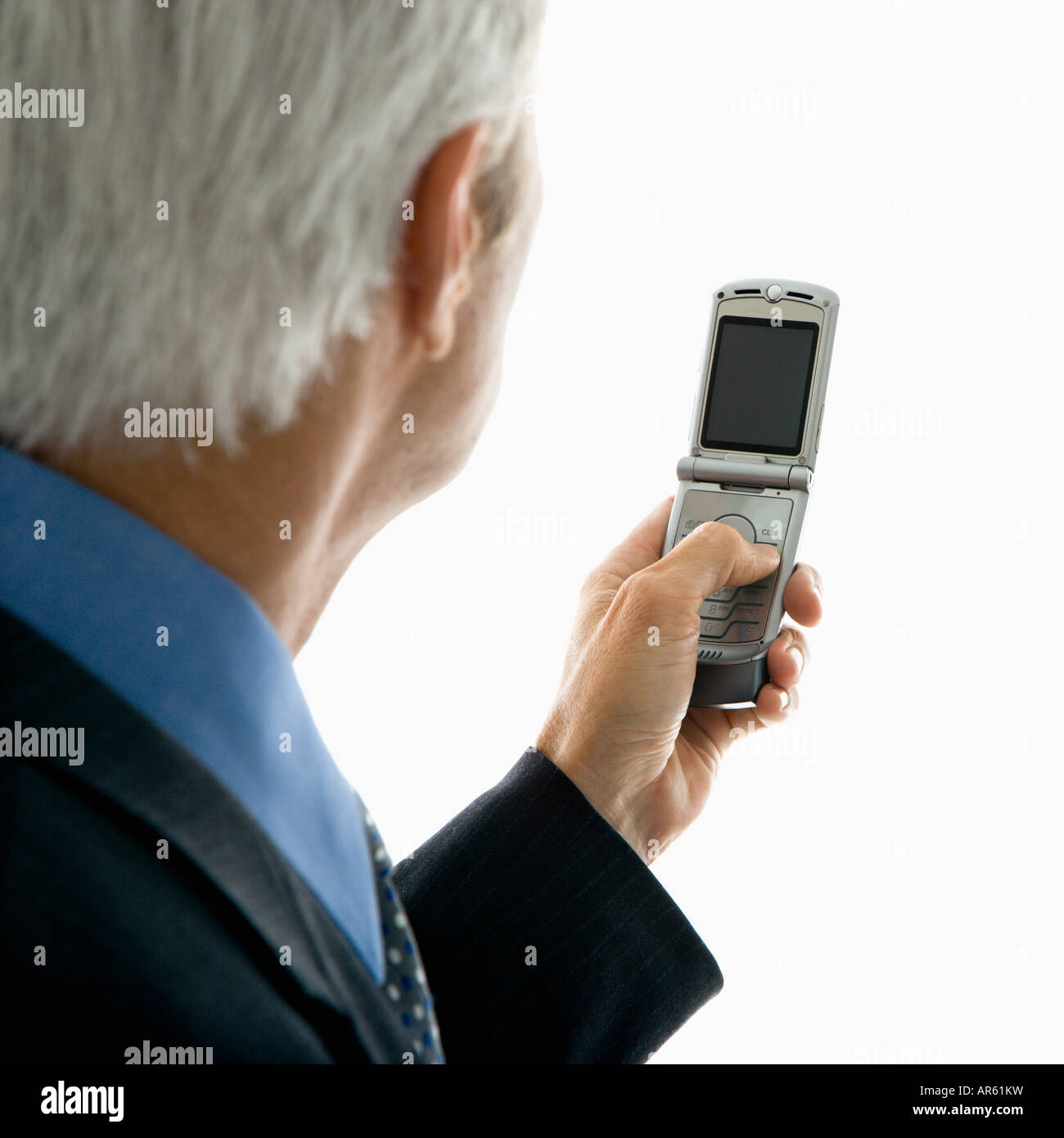 Back view of Caucasian middle aged man looking at cell phone Stock ...