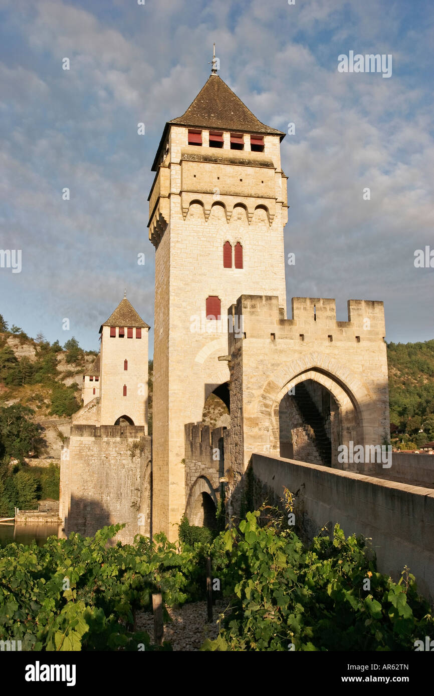 The towers of the fortified medieval bridge over the river Lot at ...