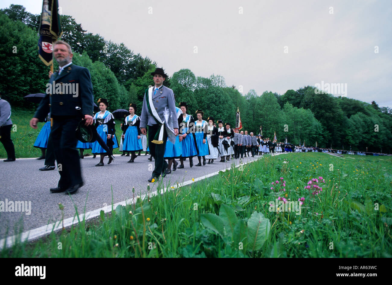 women wearing dirndl dresses and men in traditional dresses, pilgrimage ...