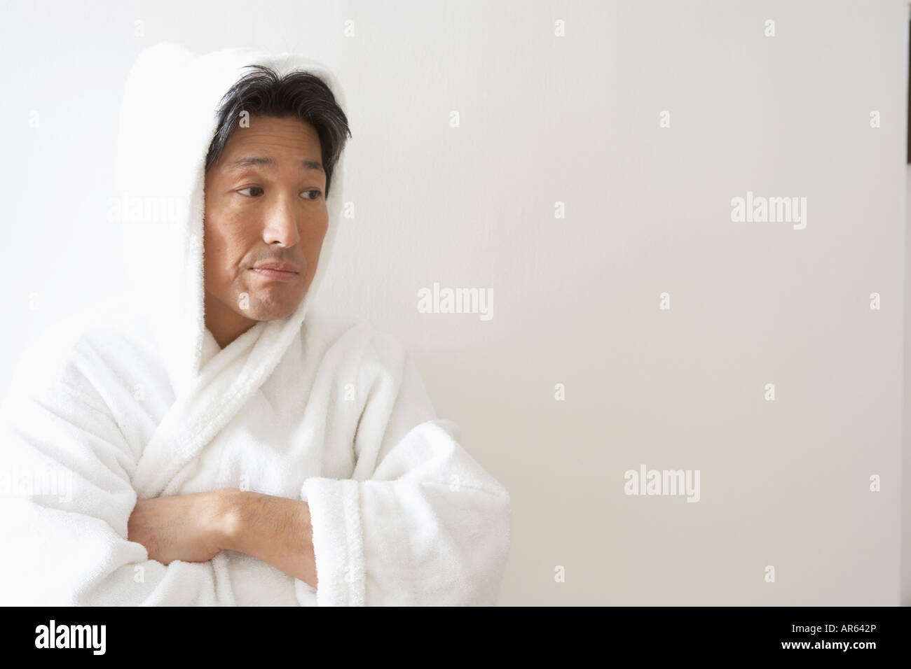 Asian man wearing bathrobe Stock Photo - Alamy