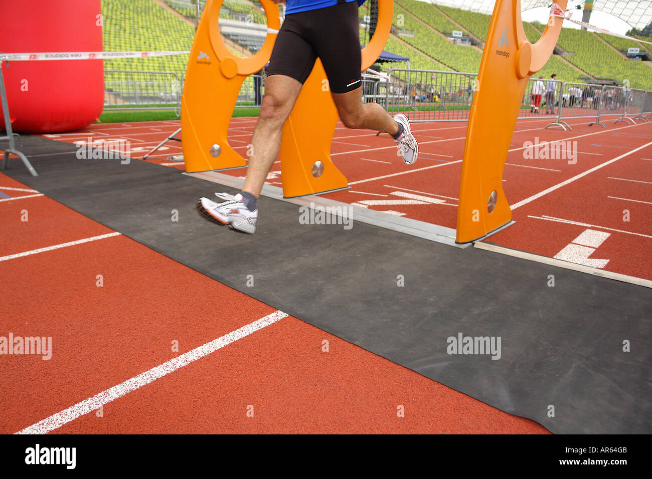 Runner finish the race at goal Stock Photo - Alamy