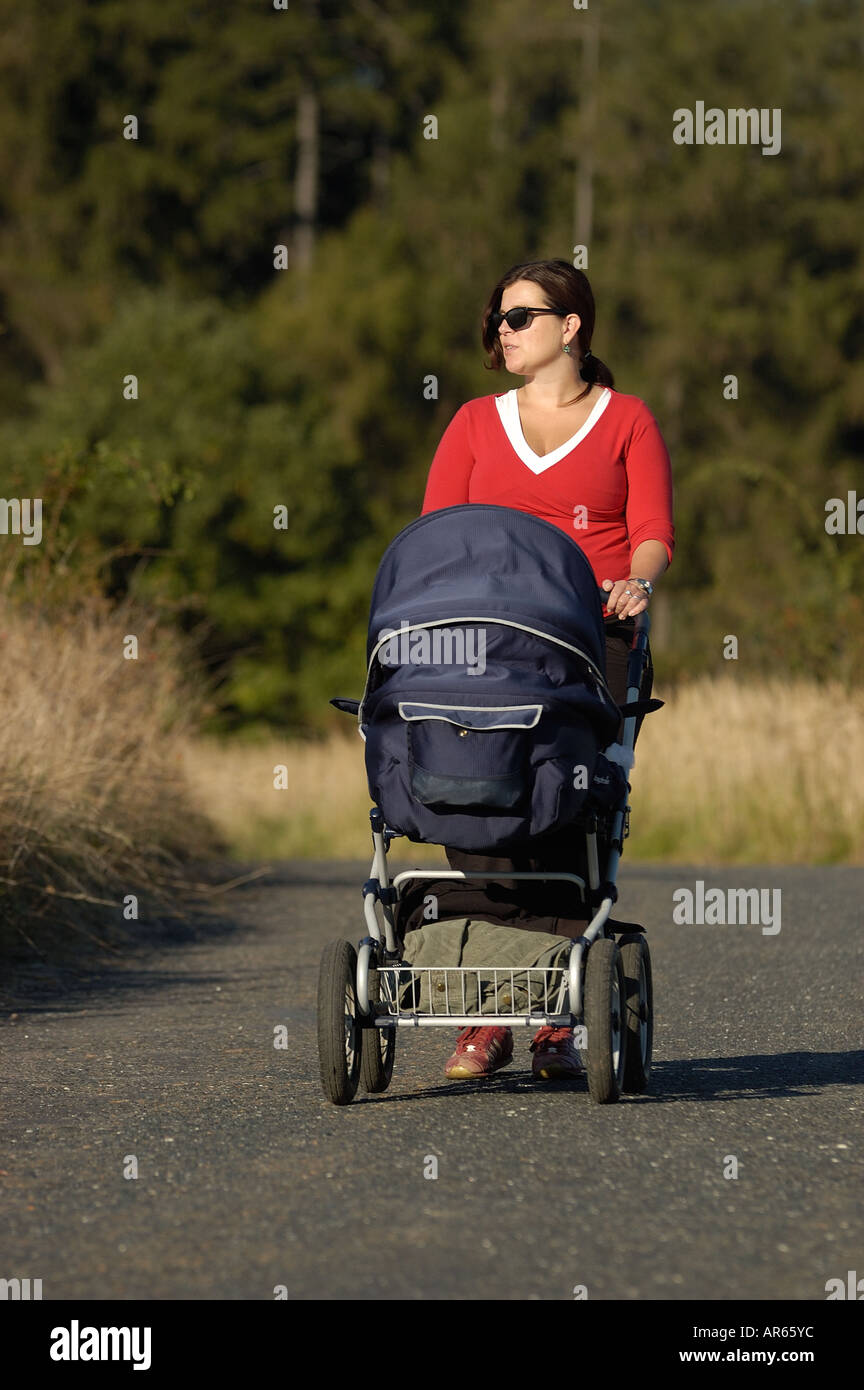 Mum pushing pram hi-res stock photography and images - Alamy