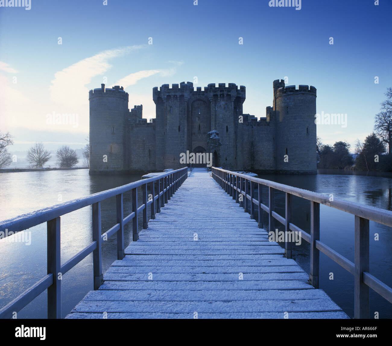 A view taken in winter across the moat bridge to the entrance front of ...