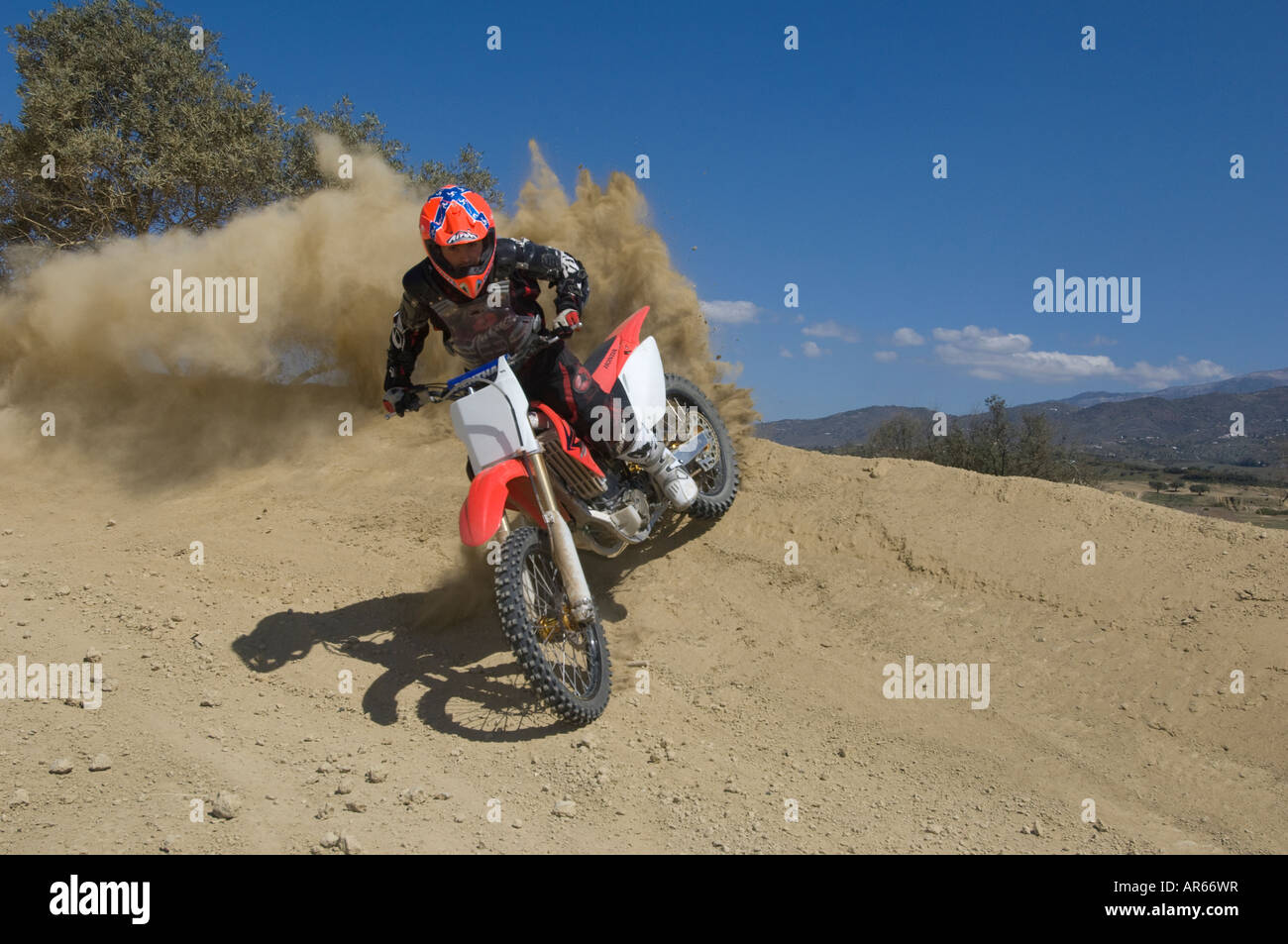 Motocross enduro biker running in circuit, Spain Stock Photo - Alamy