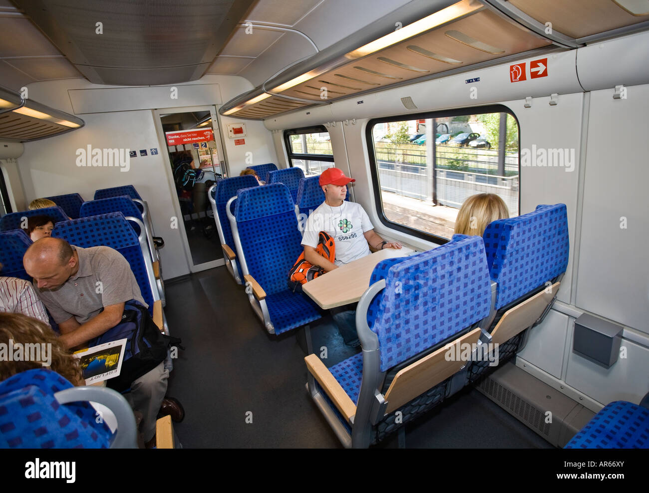 Local German train interior second class travel Stock Photo - Alamy