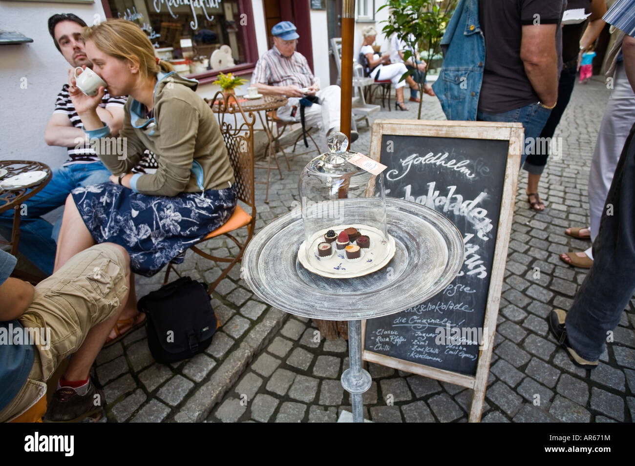People at a German café near display of chocolate truffles Chocolate ...