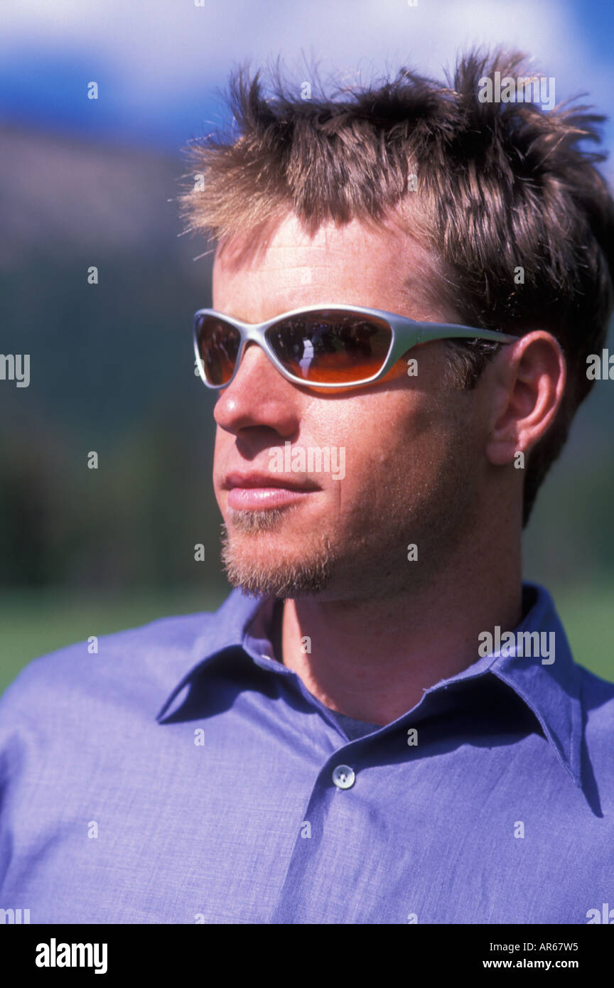 Portrait of a young man outside Stock Photo - Alamy
