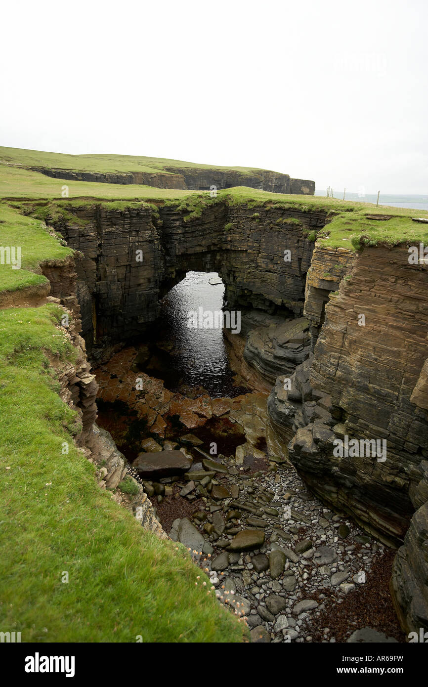 The natural arch of Sinians of Curlaws on the northwest coast of Rousay ...