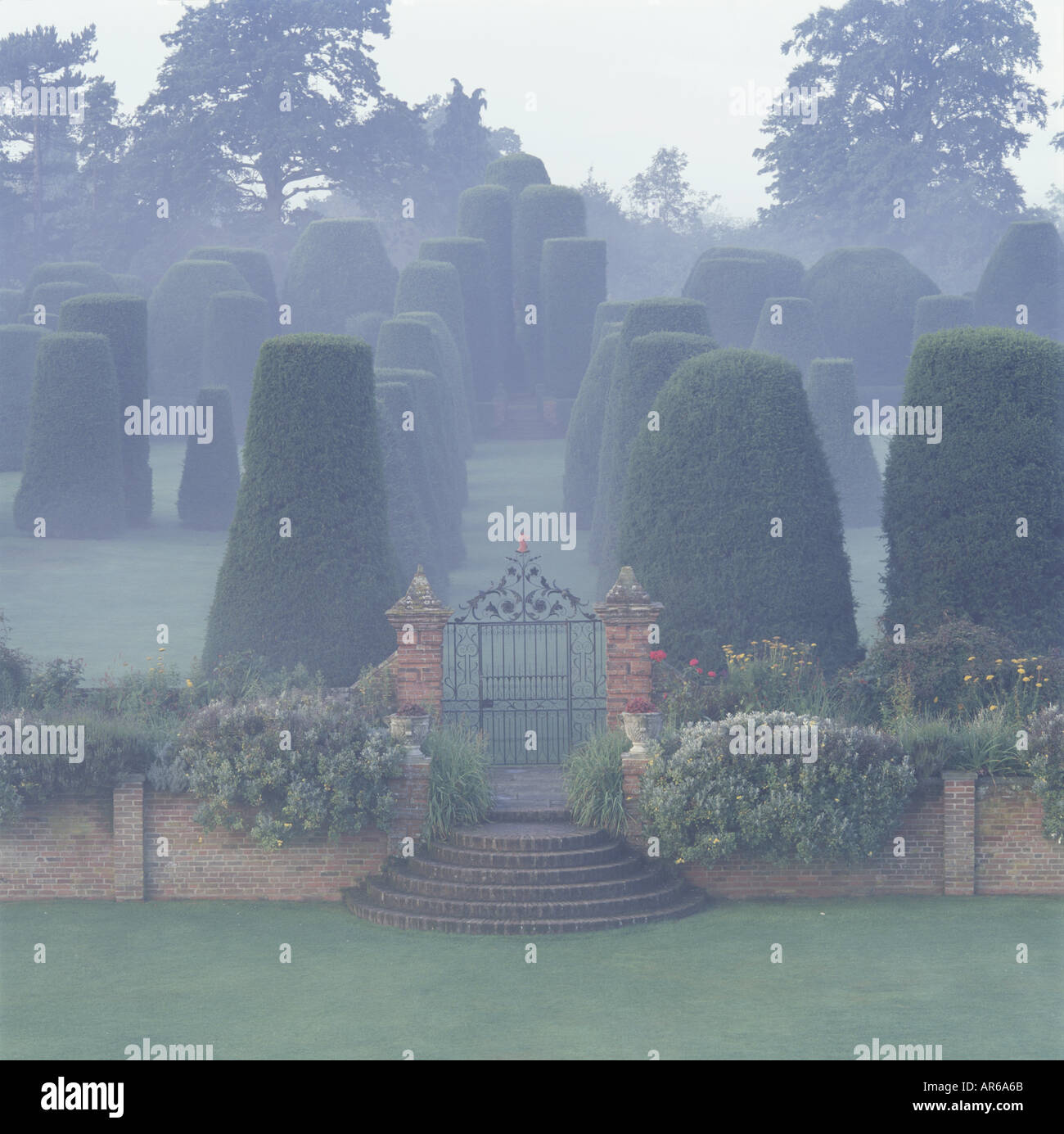 Wrought iron gates mist hi-res stock photography and images - Alamy