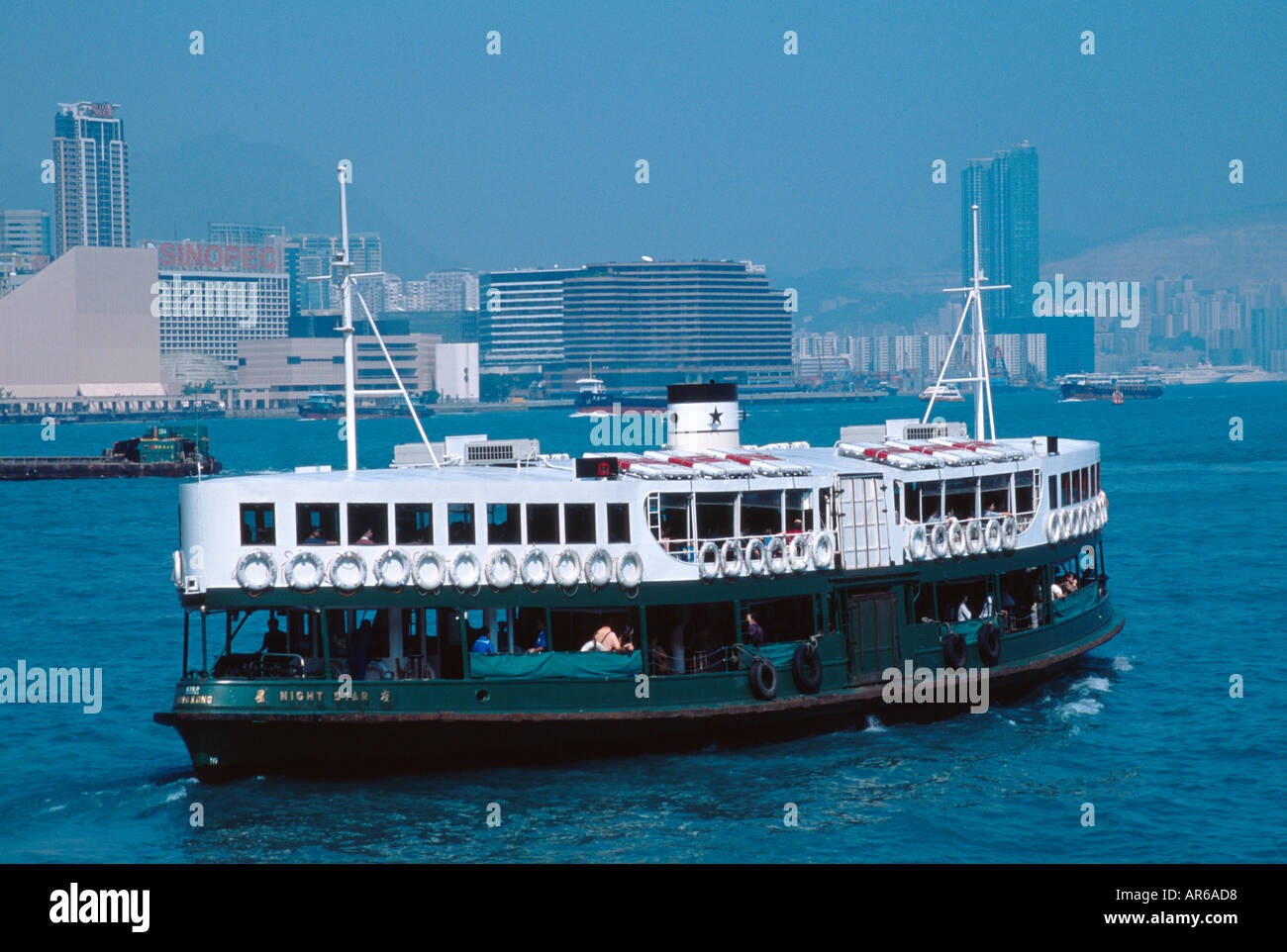 Ferries sail at victoria harbour hi-res stock photography and images ...