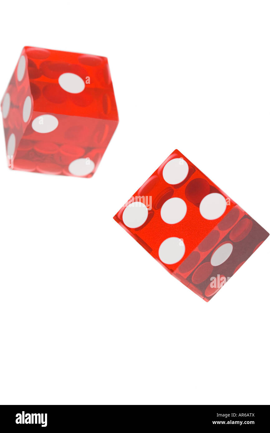 Close up two rolling dice hi-res stock photography and images - Alamy