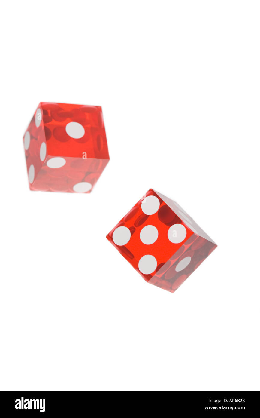 Close up two rolling dice hi-res stock photography and images - Alamy