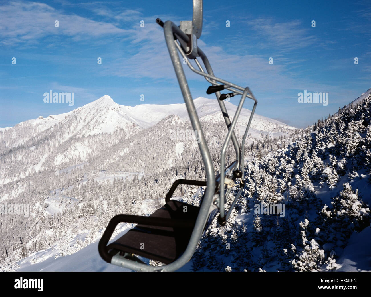 Ski-lift and snow peaks Stock Photo - Alamy