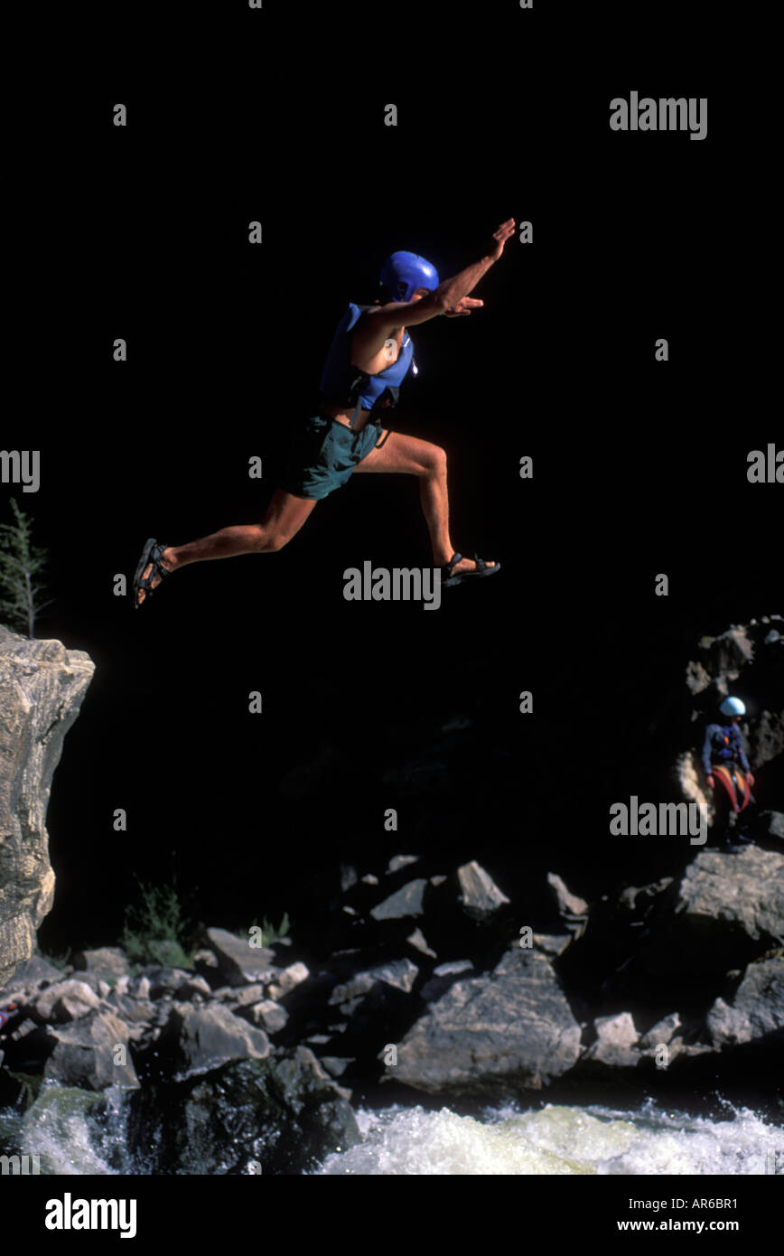 One person jumping off rock hi-res stock photography and images - Alamy