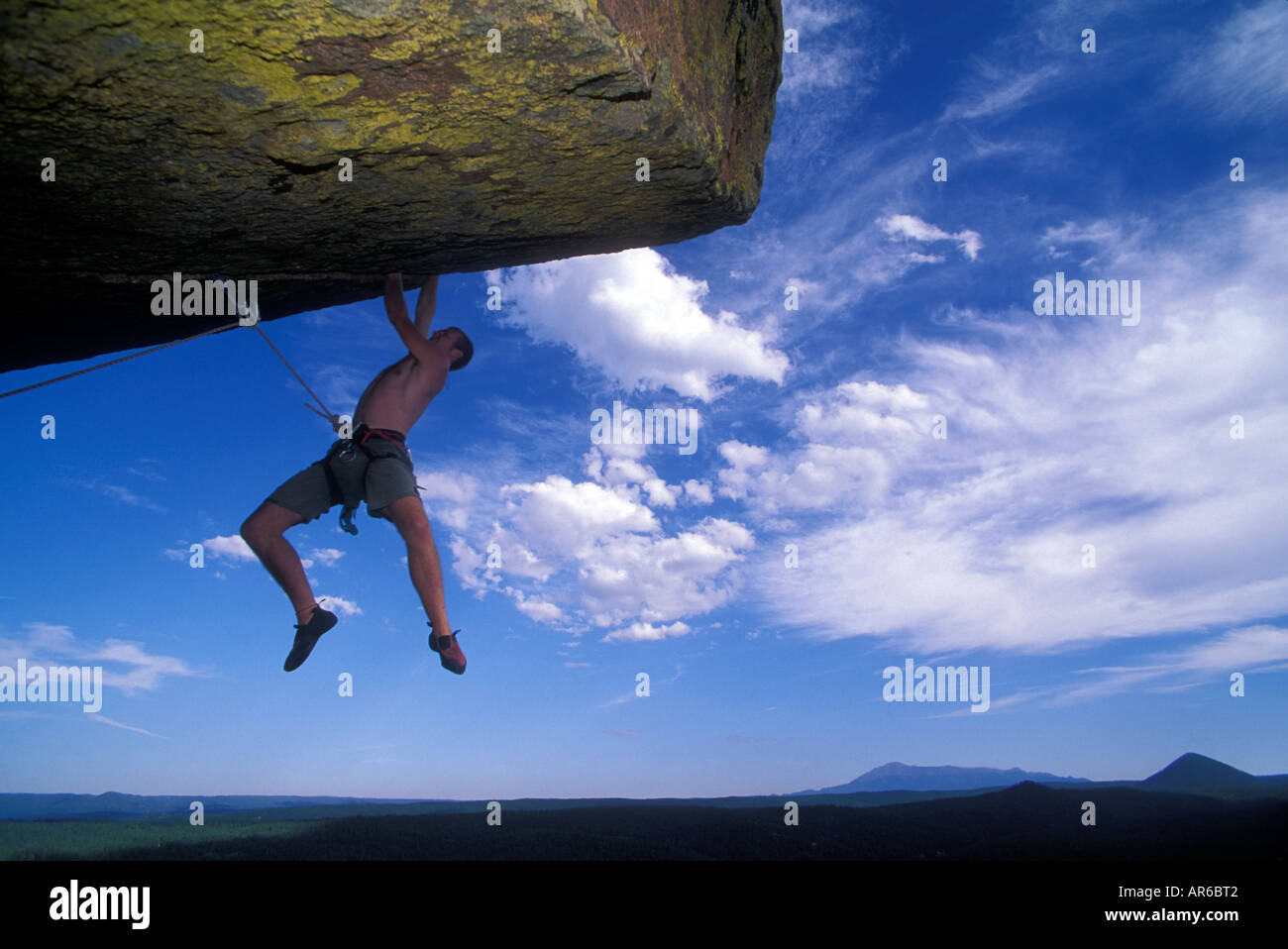Person under rock overhang hi-res stock photography and images - Alamy