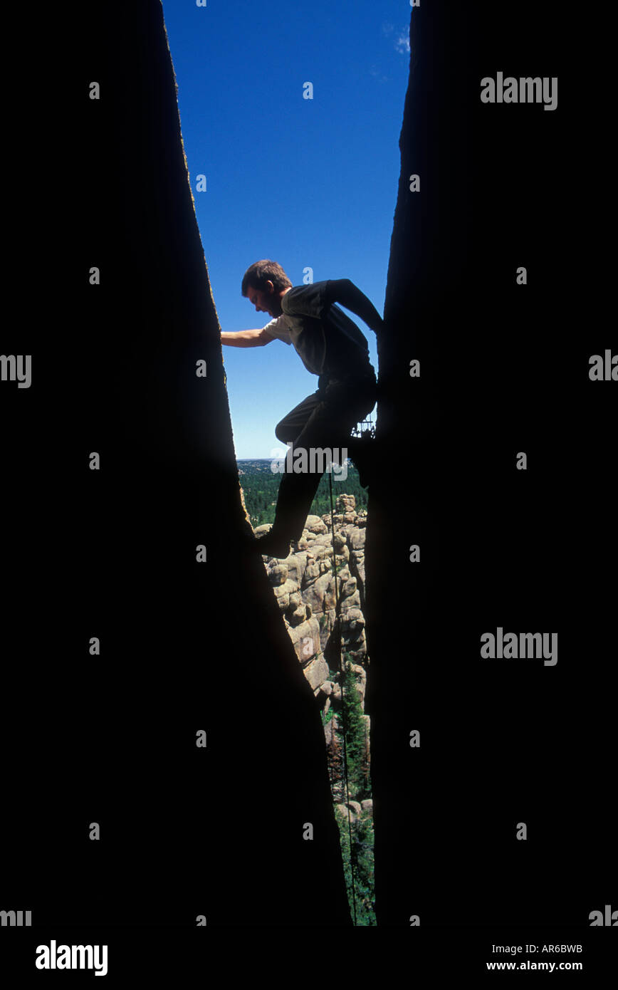 Rock climber climbing in a chimney hi-res stock photography and images ...