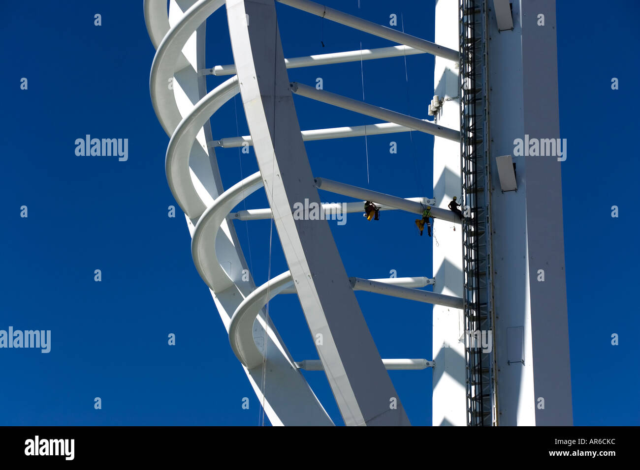 Construction workers abseil on the Spinnaker Tower in Portsmouth ...
