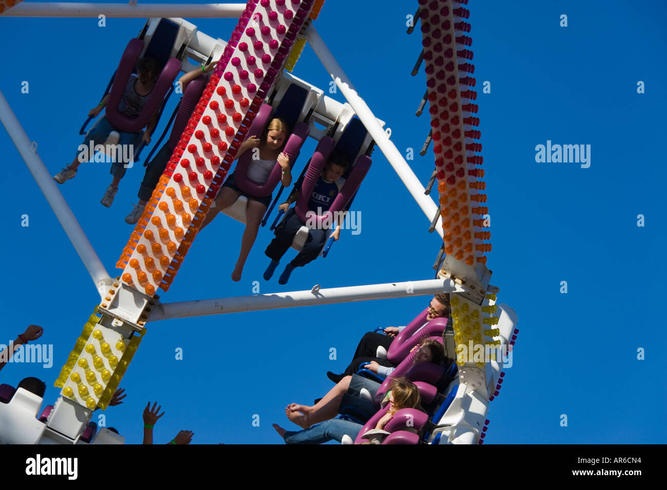 Children enjoying a funfair ride hi-res stock photography and images ...