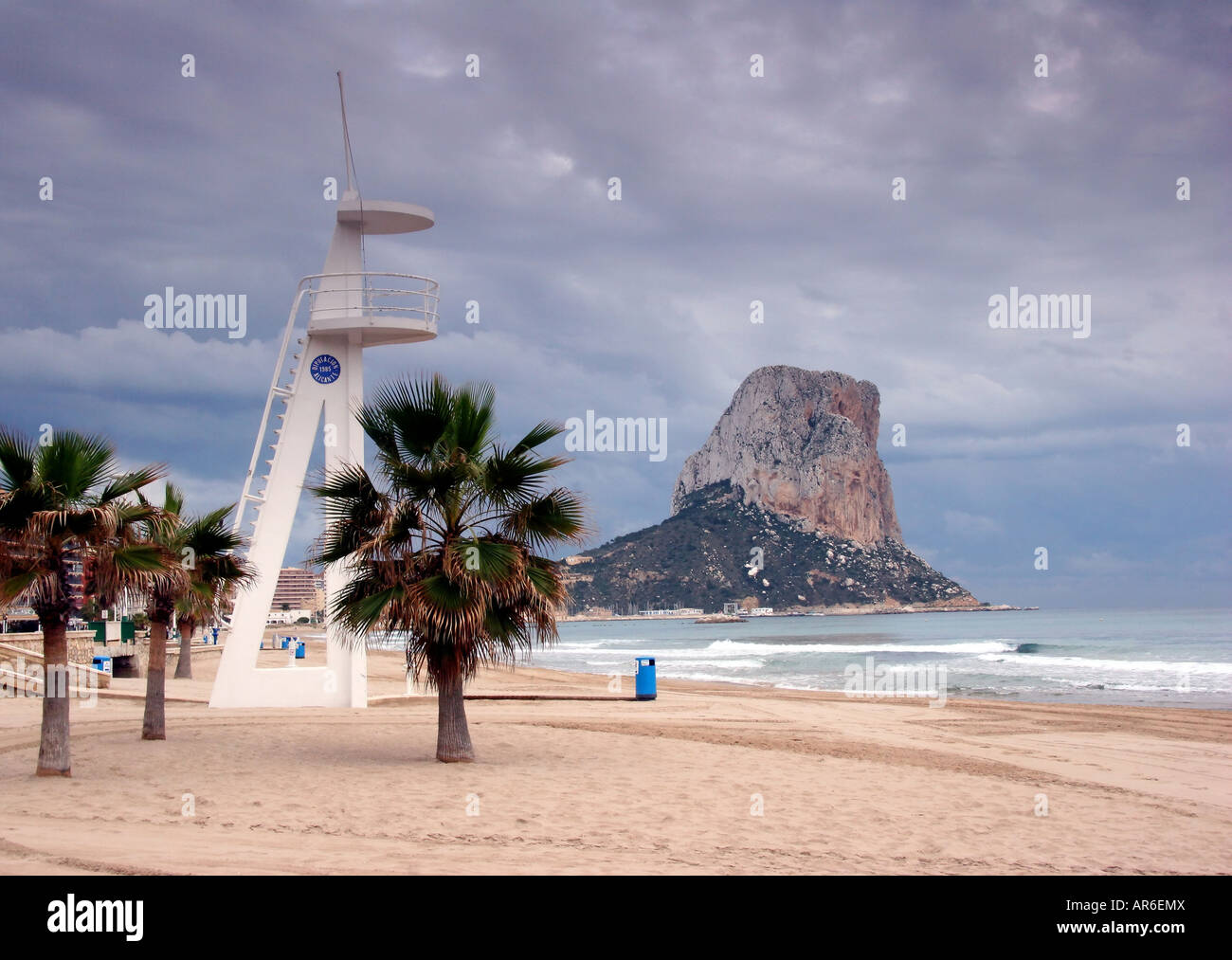 The Penon de Ifach rises 360m above the Salinas de Calpe Stock Photo ...