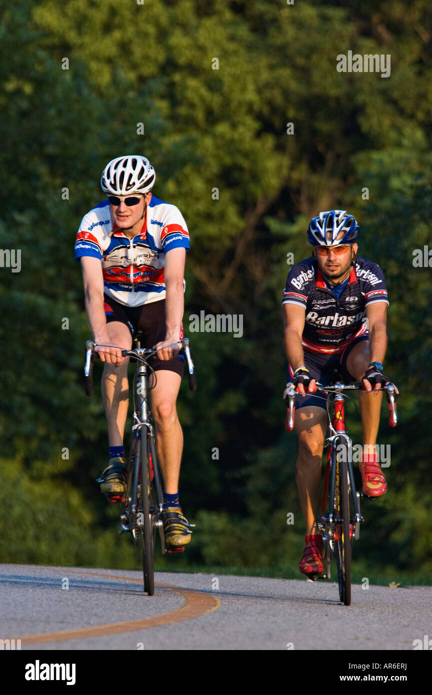 Two Men Riding Road Bikes through Cherokee Park Louisville Kentucky ...