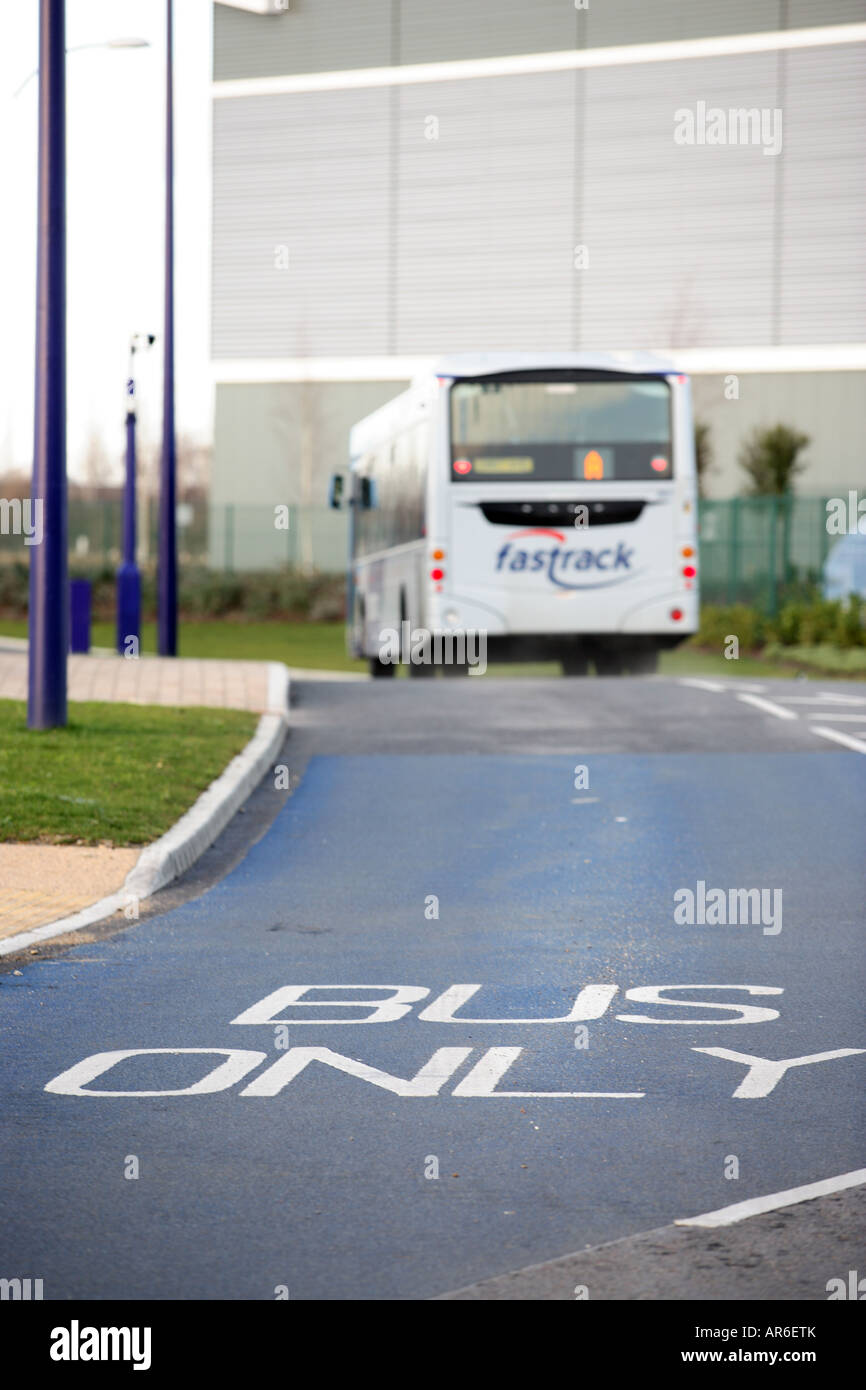 A shot of the rear of a bus travelling in a bus lane Stock Photo - Alamy