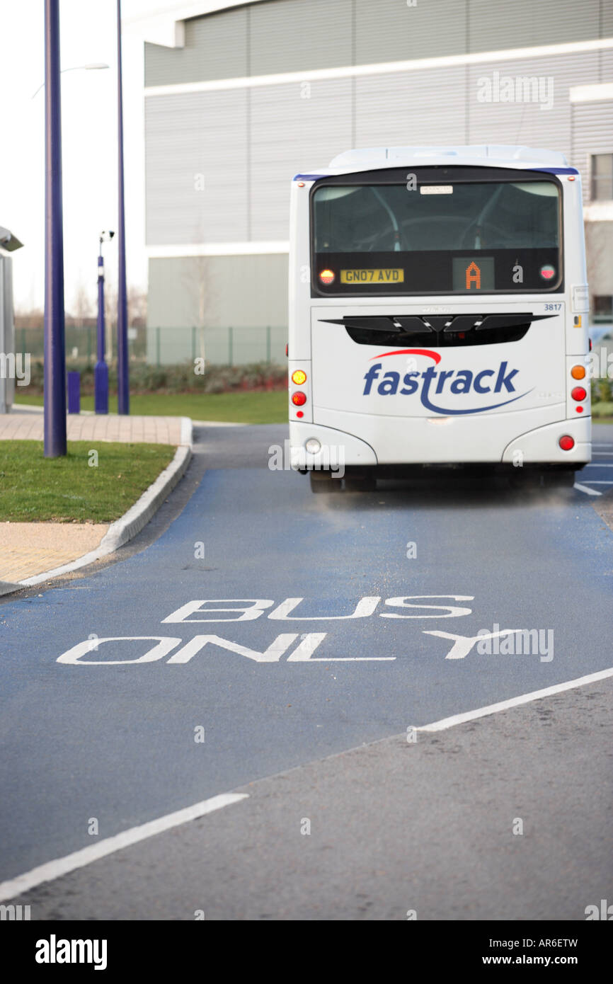 A shot of the rear of a bus travelling in a bus lane Stock Photo - Alamy