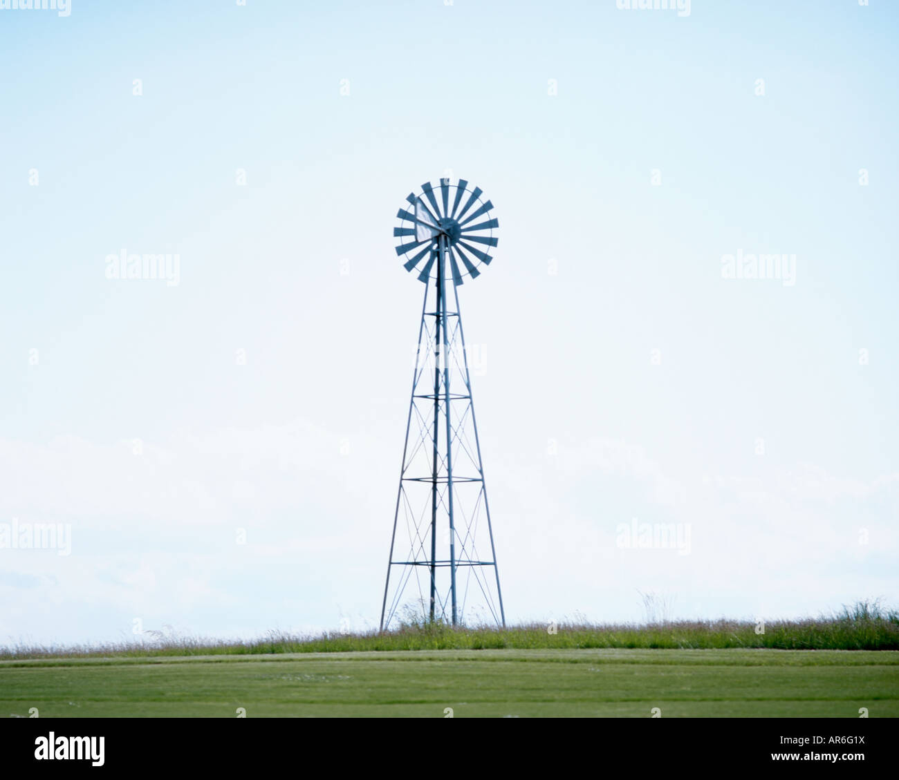 Windmill on farm Stock Photo - Alamy