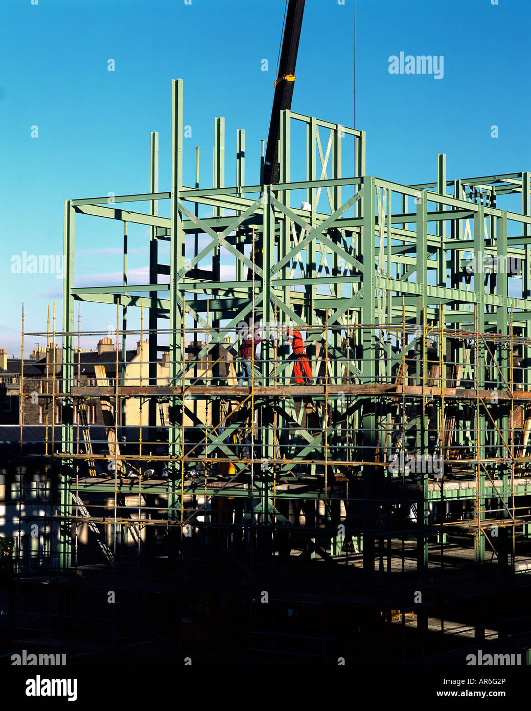 Men working on construction site Stock Photo - Alamy