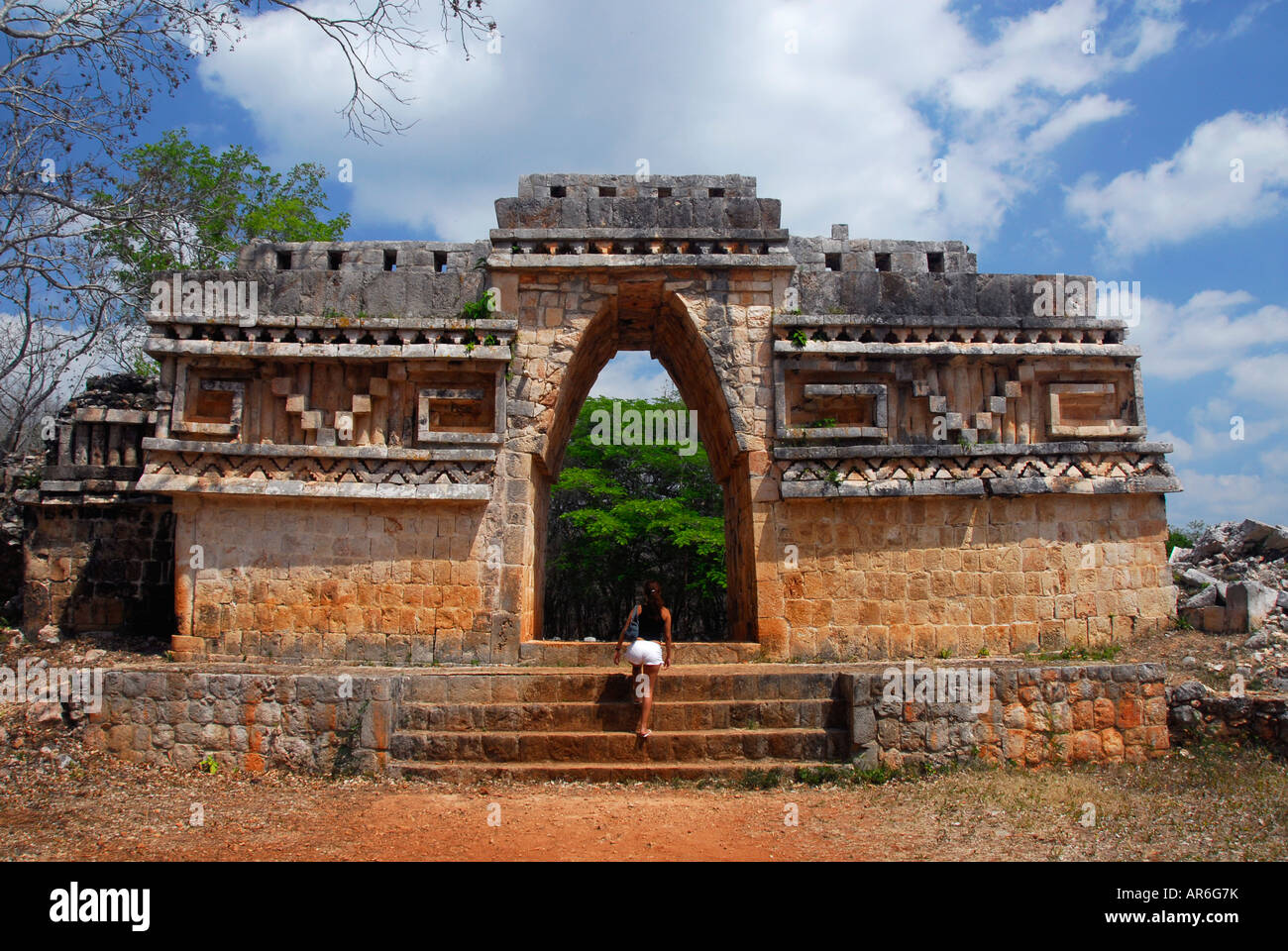 Female tourist under the arch of Labna, Yucatan State, Mexico, North ...