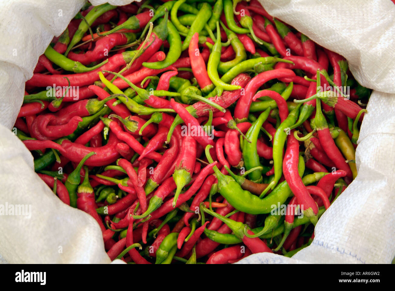 Red Chilli green pepper whole fresh sweet sack bag Stock Photo - Alamy