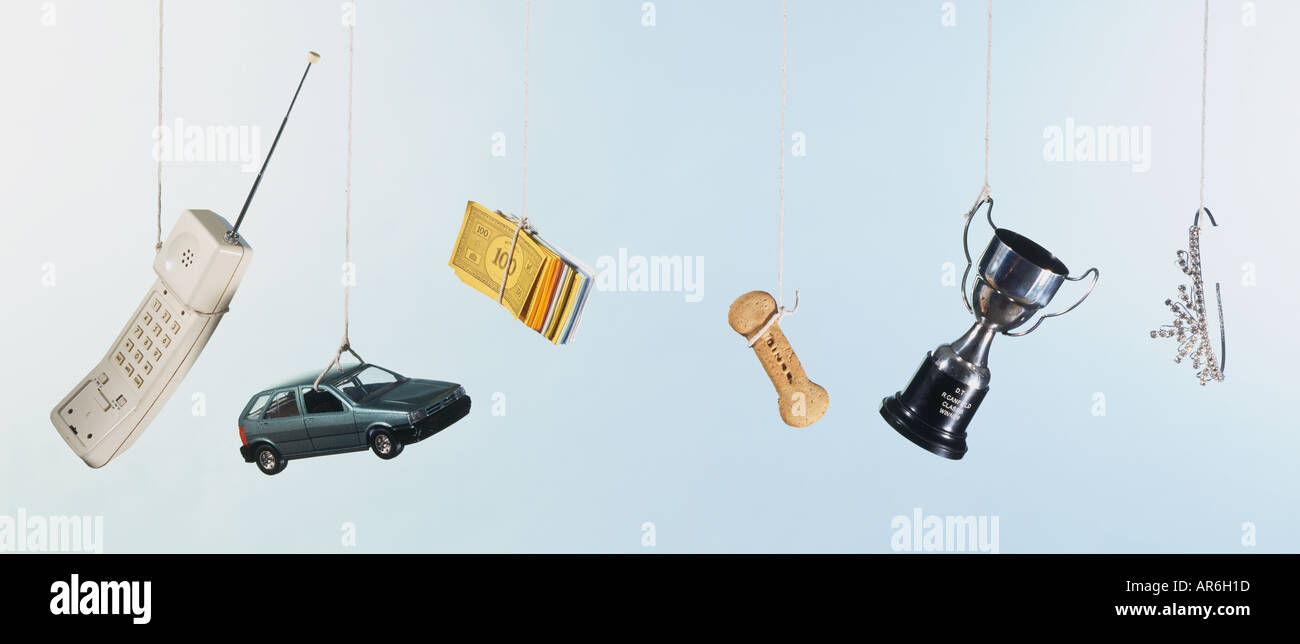 Various objects hanging from strings hi-res stock photography and ...