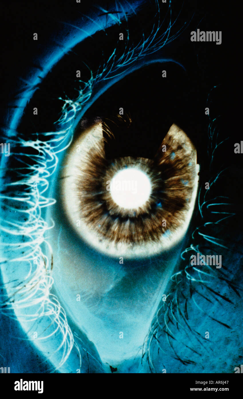 Negative image of human eye, long white eyelashes, blue hue dominating ...