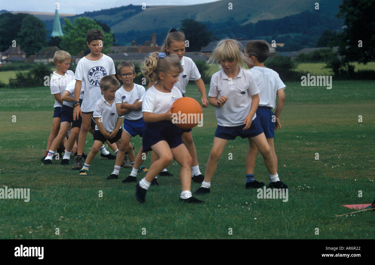 primary school children playing team sports Stock Photo - Alamy