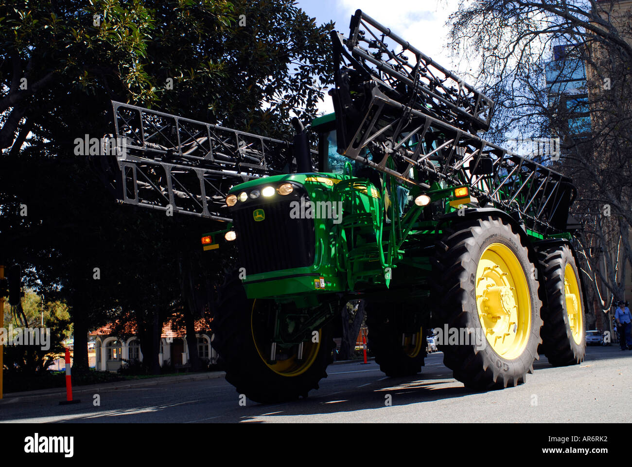 John-Deere 4920 Self-Propelled Sprayer driving through the streets of ...