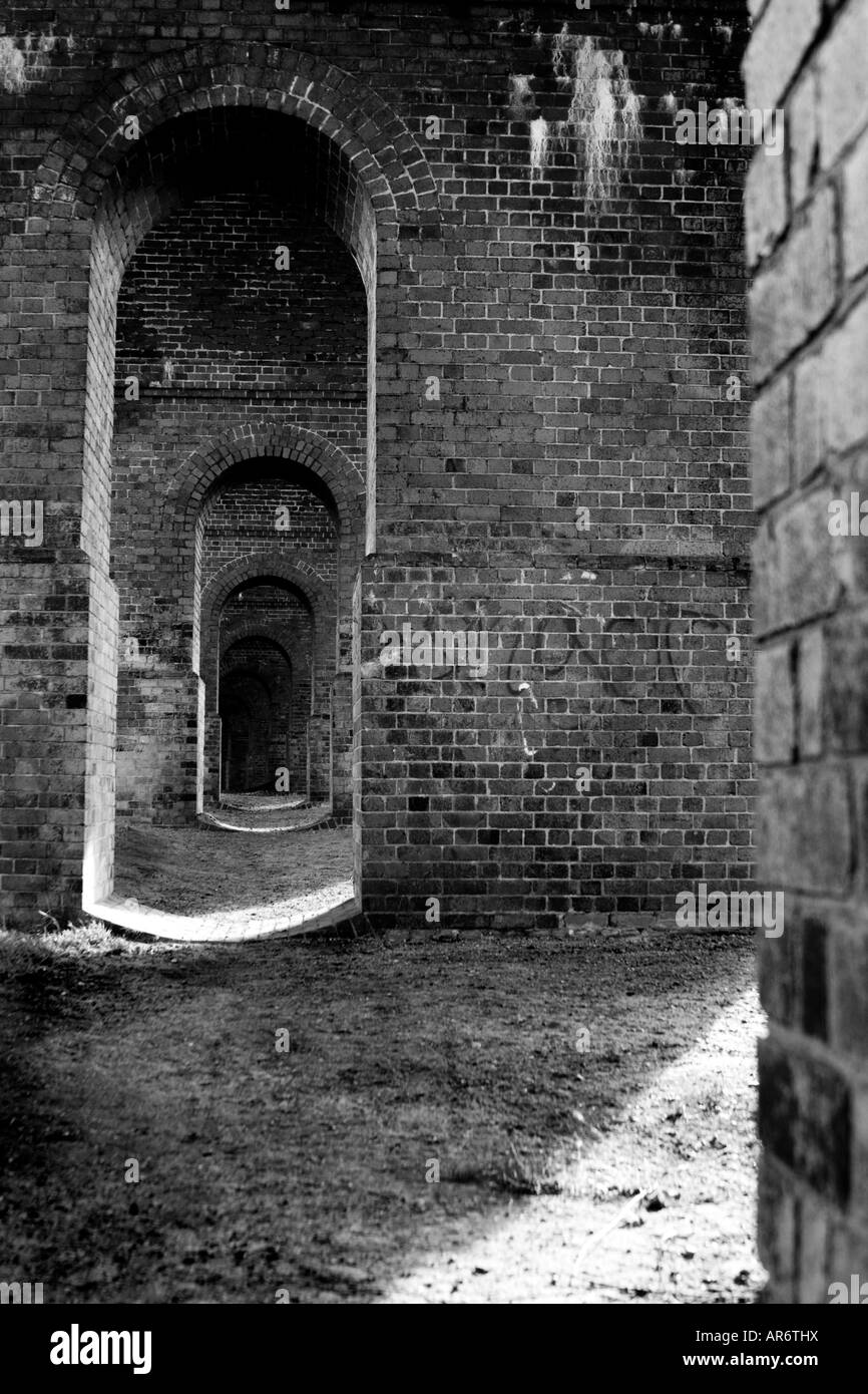 Series of archways under railway bridge, North London, England, UK ...
