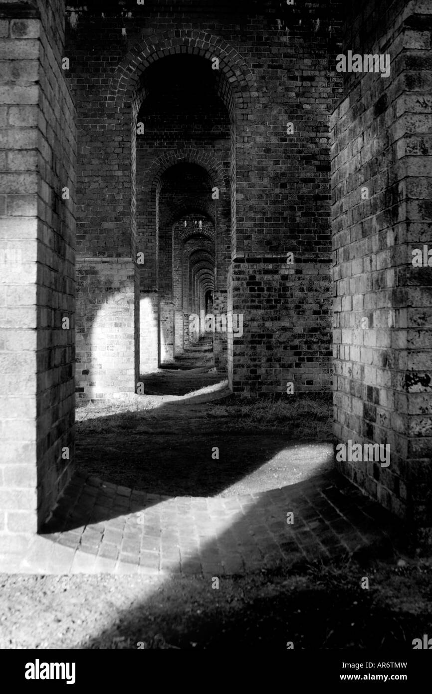 Series of archways under railway bridge, North London, England, UK ...