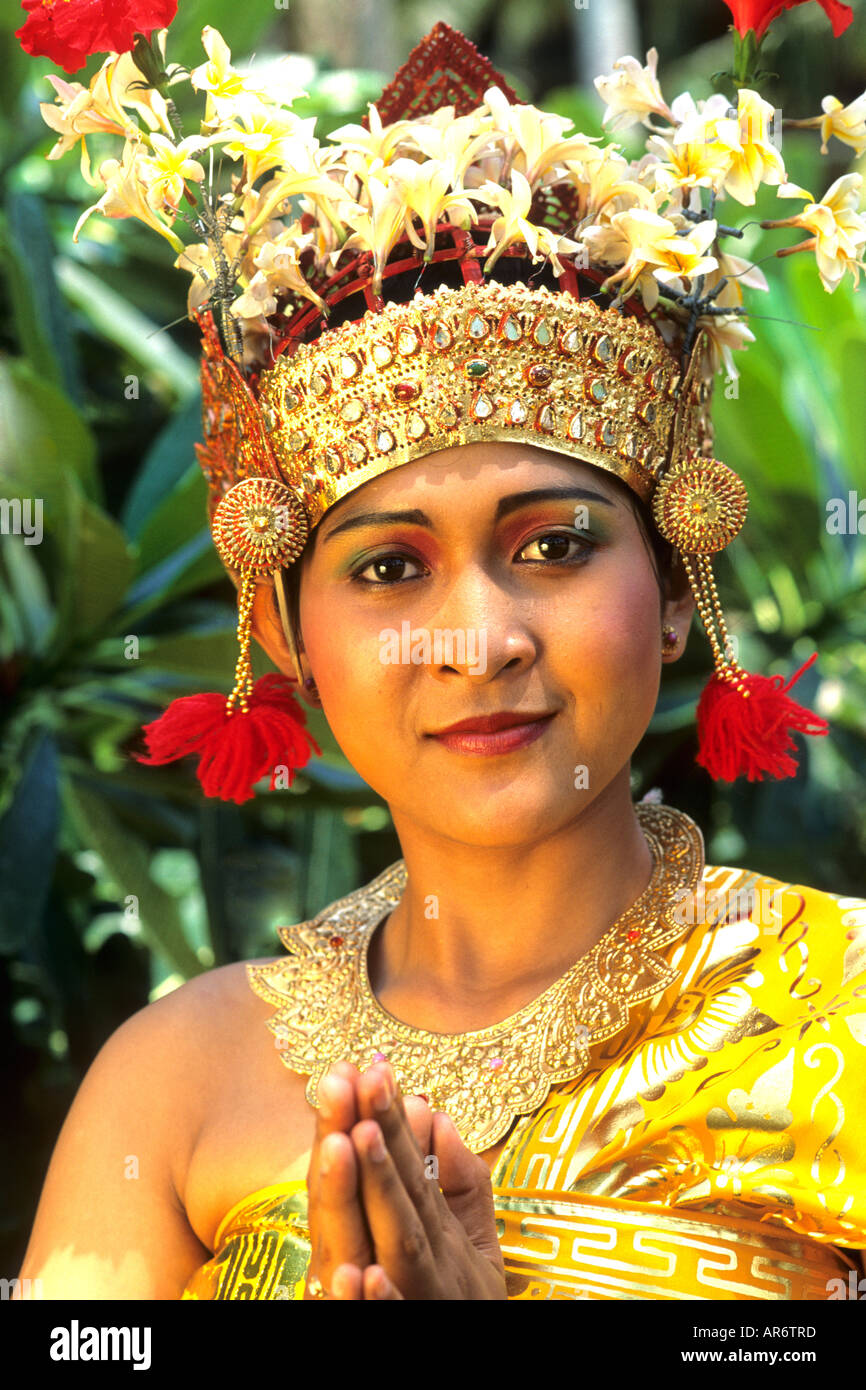 Beautiful golden bride in colorful traditional dress in wedding in Bali ...