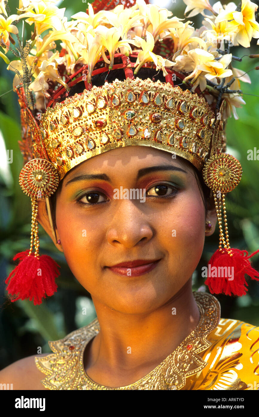 Beautiful golden bride in colorful traditional dress in wedding in Bali ...