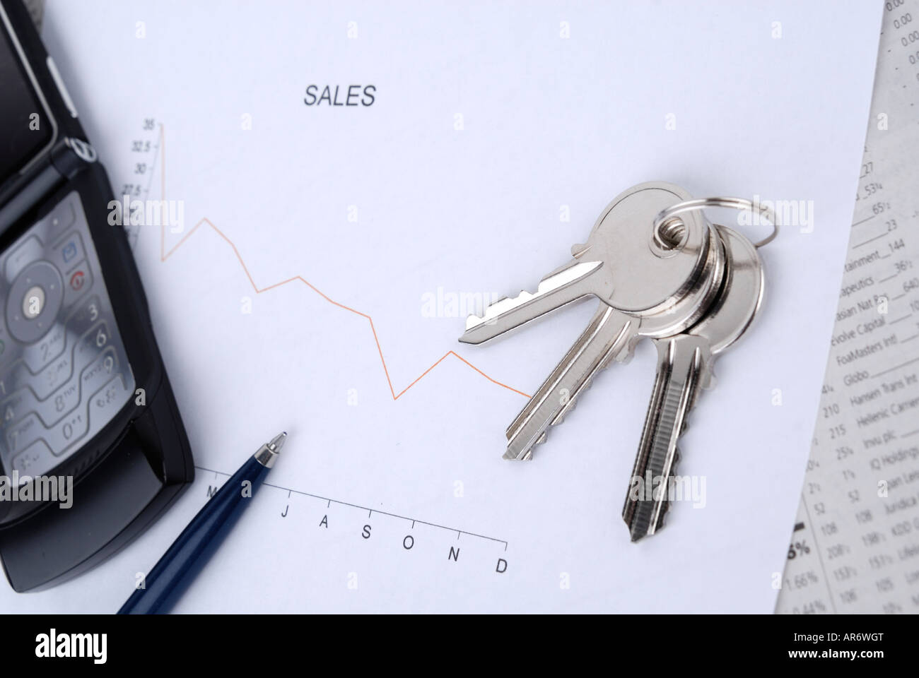 Office items on a graph Stock Photo - Alamy