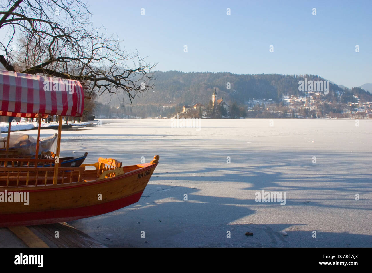 Lake Bled frozen in winter Slovenia Stock Photo - Alamy