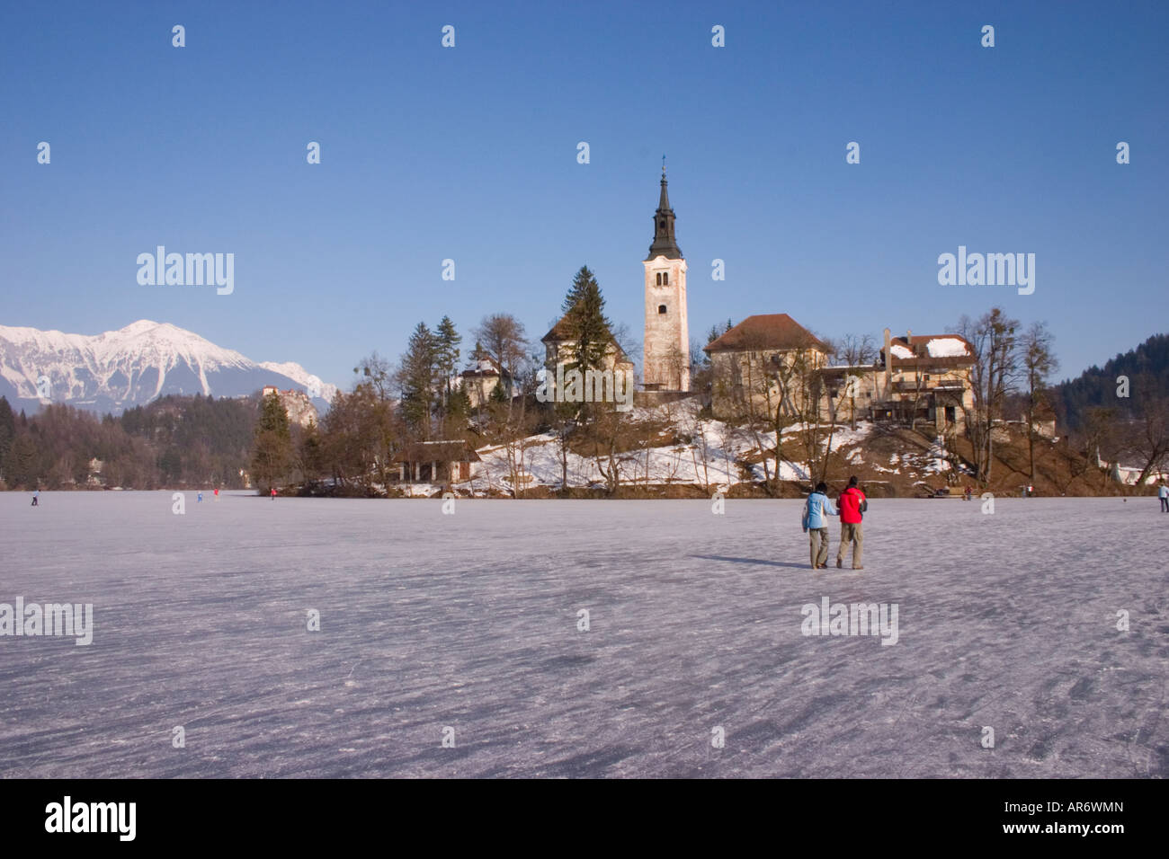 Lake Bled frozen in winter Slovenia Stock Photo - Alamy