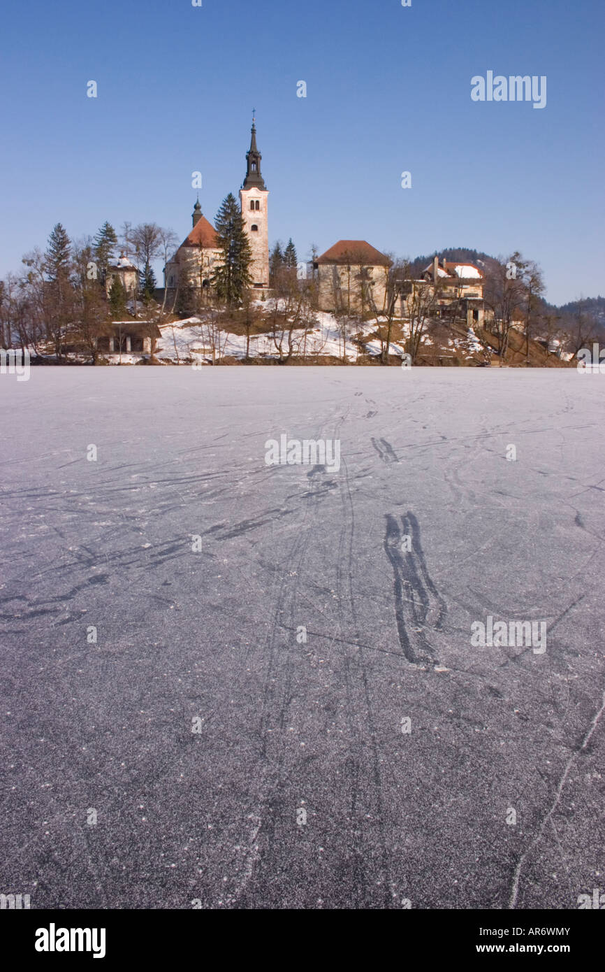 Lake Bled frozen in winter Slovenia Stock Photo - Alamy