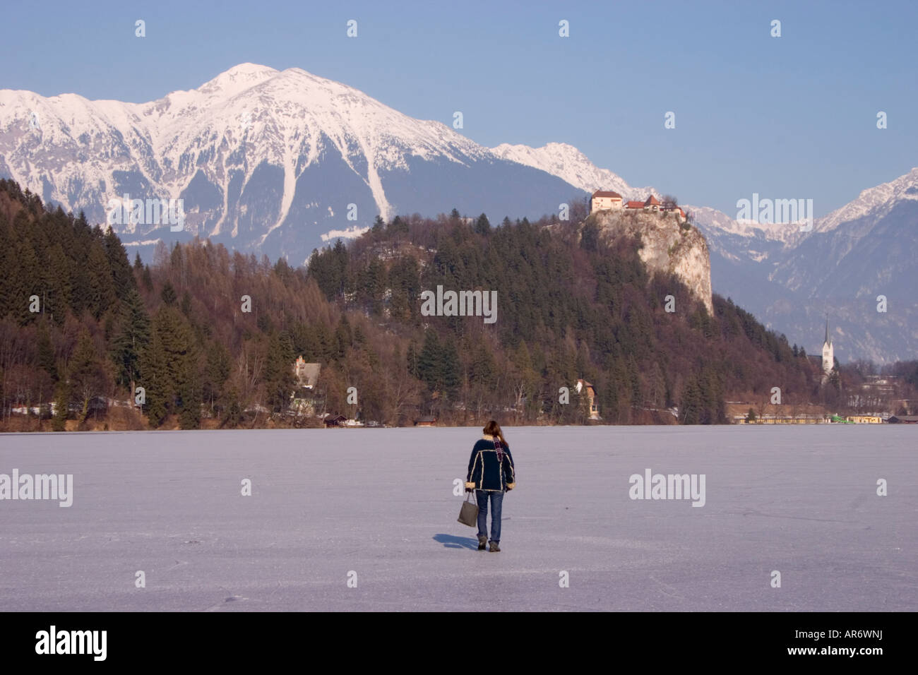 Lake Bled frozen in winter Slovenia Stock Photo - Alamy